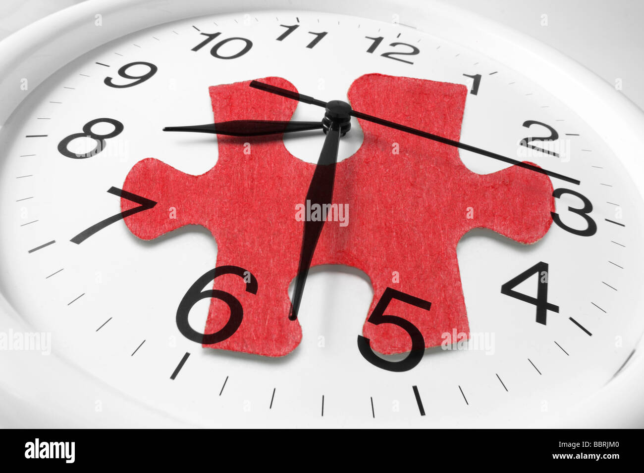 Clock and Jigsaw Puzzle Stock Photo - Alamy