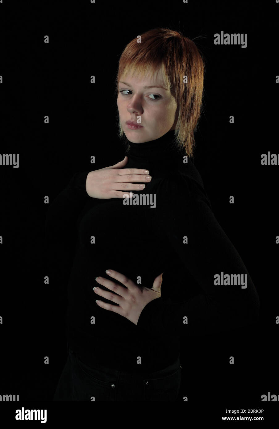 Female model on dark background Stock Photo - Alamy