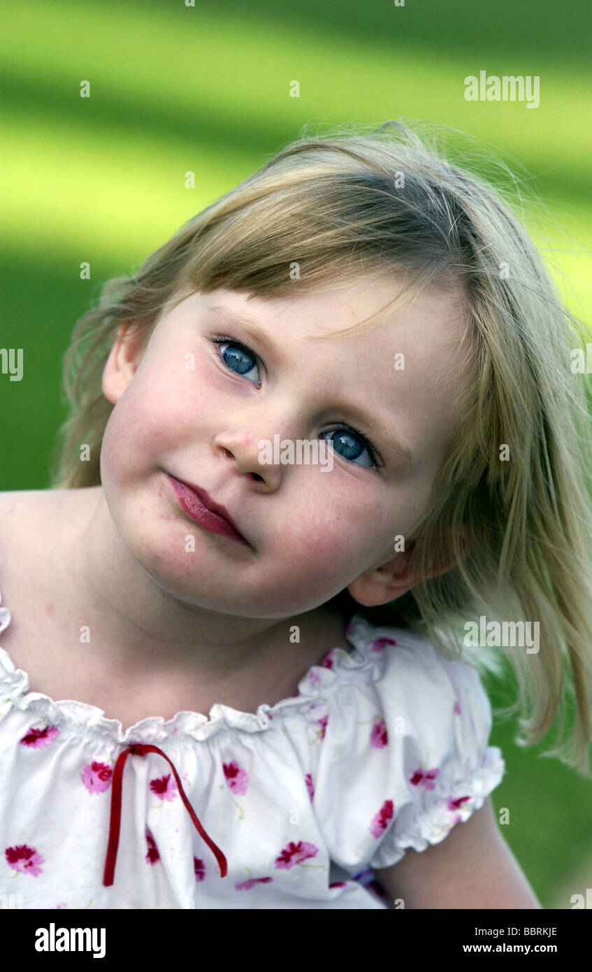 A pretty three year old girl with blue eyes Stock Photo - Alamy