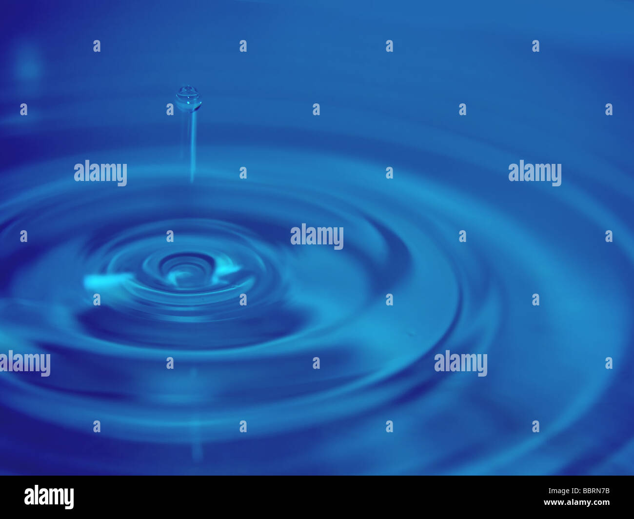 drop of water falls in bottom Stock Photo - Alamy