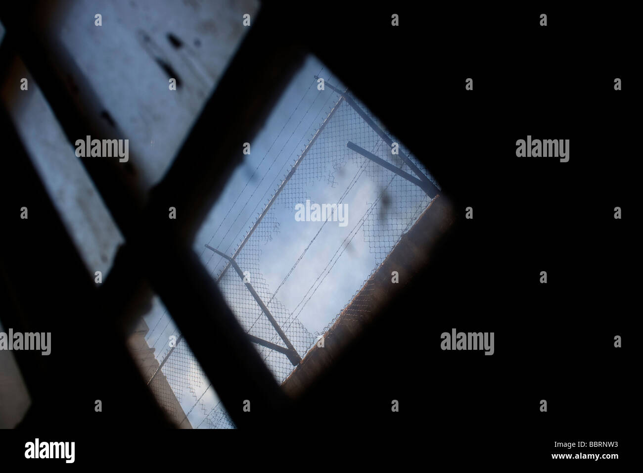 View through a window in Alcatraz Penitentiary showing a hole in the ...