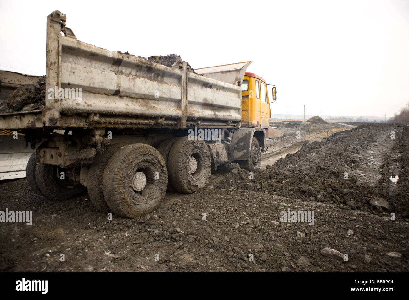 dirty dump Truck on build Stock Photo - Alamy