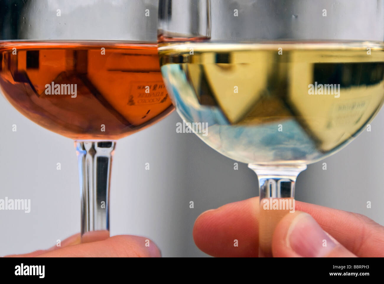 Close-up Of Hands Toasting Wine Glass Stock Photo - Alamy