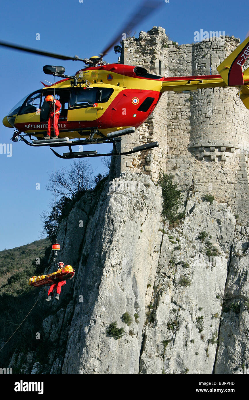 Rescue stretcher helicopter winching hi-res stock photography and ...