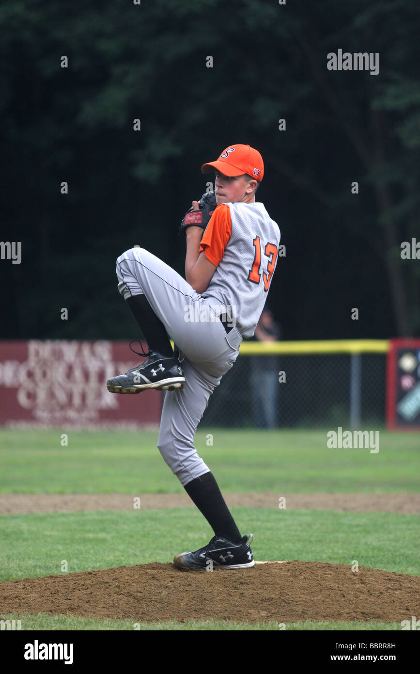 A little league baseball player winds up for a pitch Stock Photo - Alamy