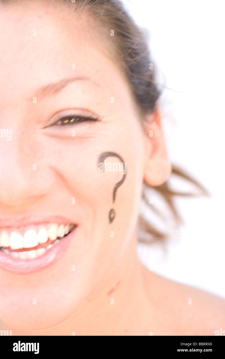 Question mark simbol painted in woman´s face and thinking on answer ...