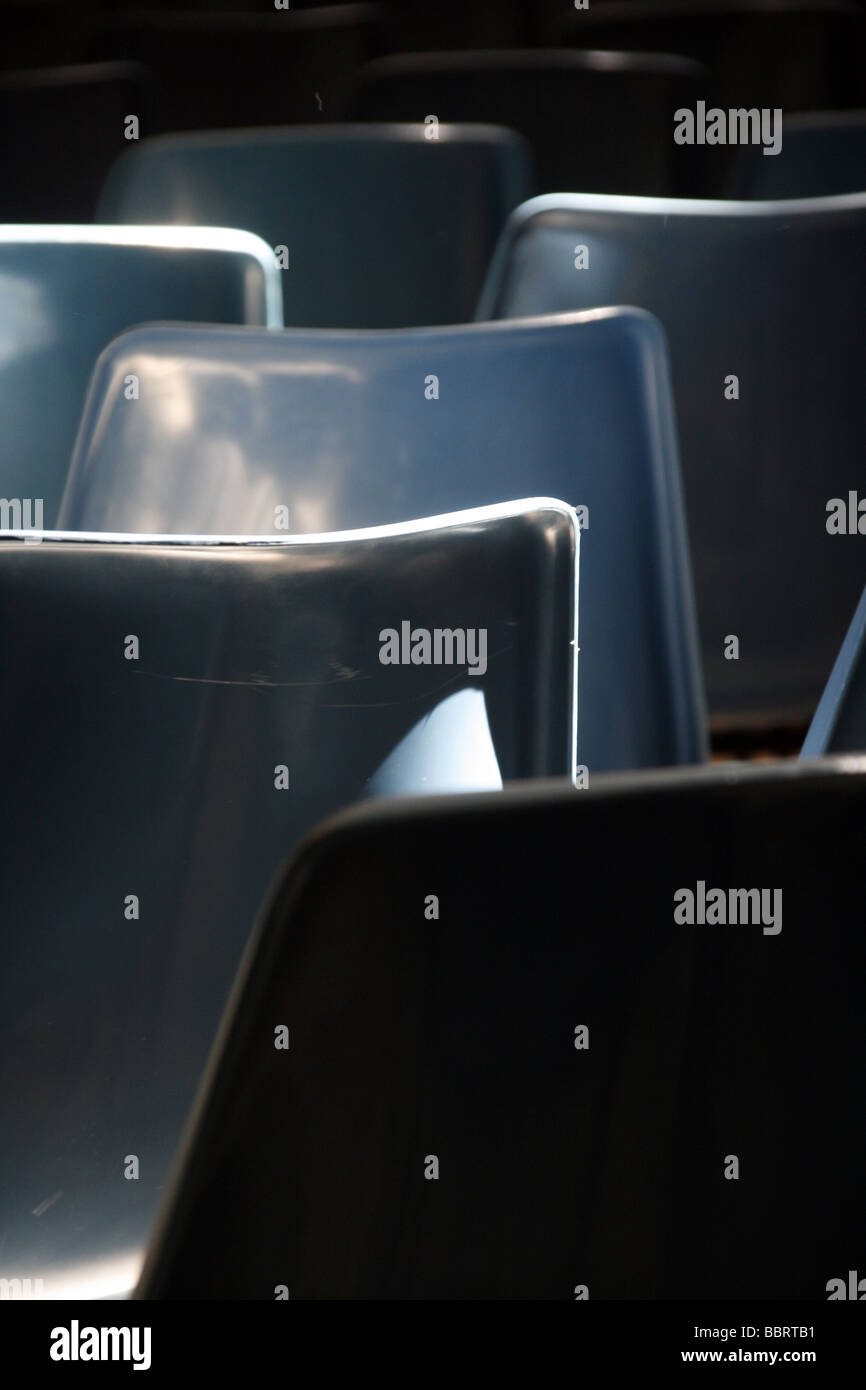 rows of empty plastic chairs in church in rome italy Stock Photo - Alamy