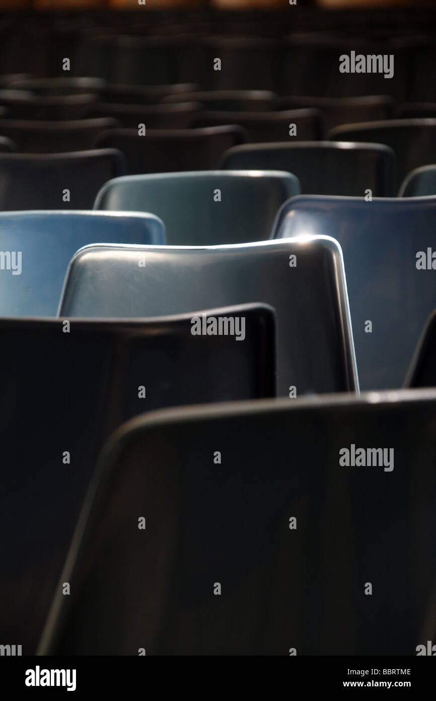 rows of empty plastic chairs in church in rome italy Stock Photo - Alamy