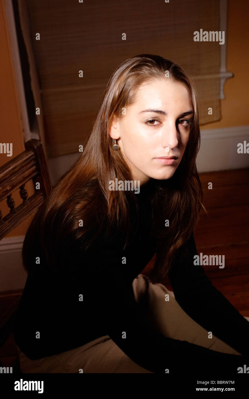 Young woman indoors Stock Photo - Alamy