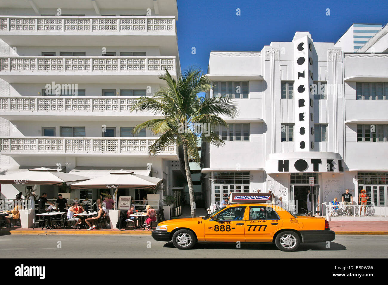 YELLOW TAXI ON OCEAN DRIVE, ART DECO NEIGHBORHOOD IN MIAMI BEACH, MIAMI ...