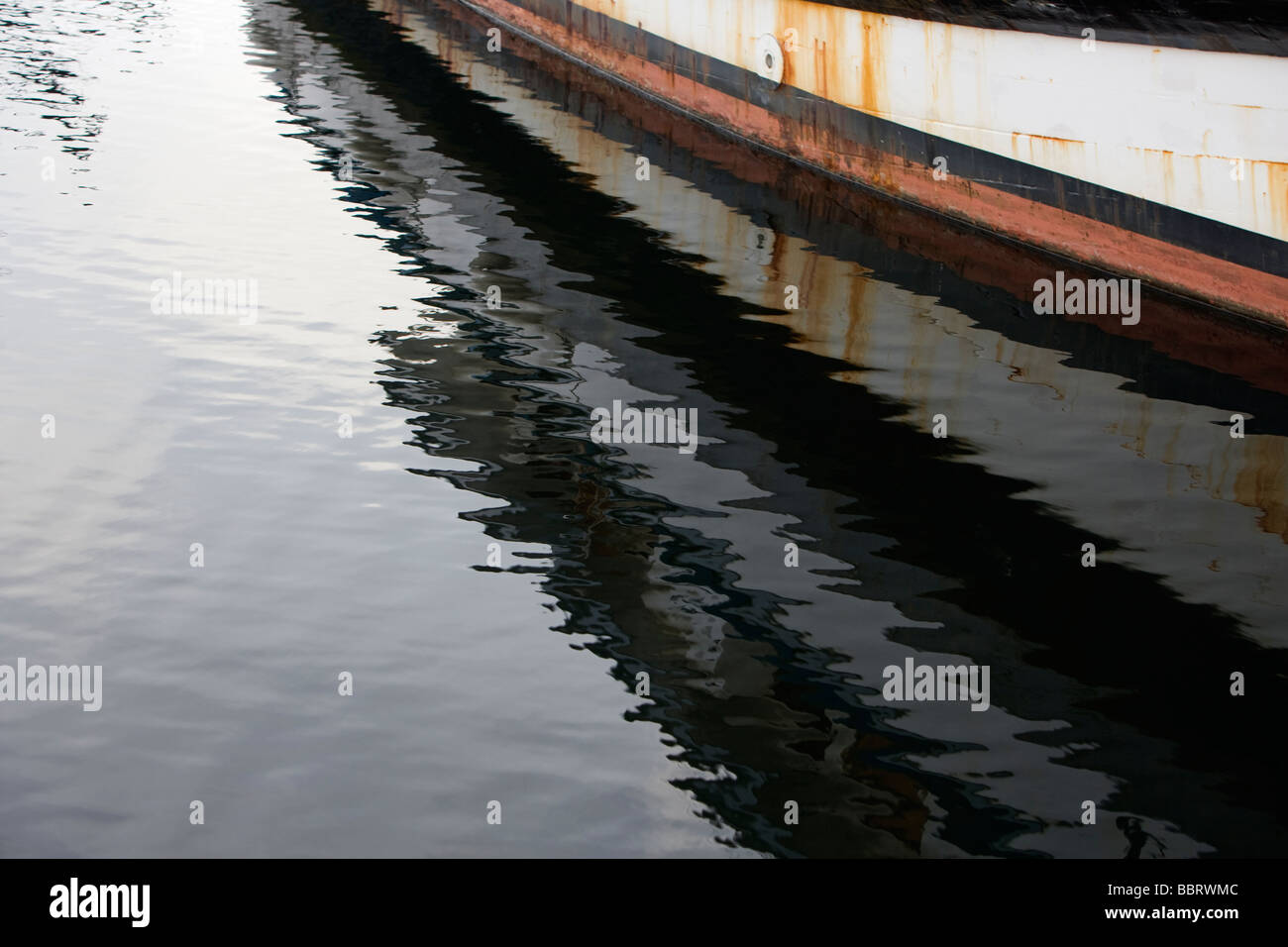 Fishing Boat Reflections Stock Photo - Alamy