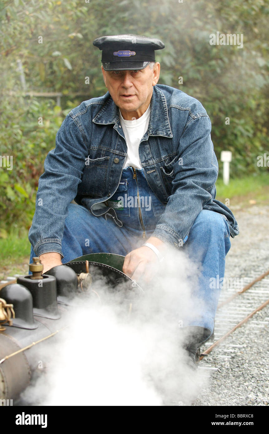 A model steam powered train locomotive engine Stock Photo - Alamy