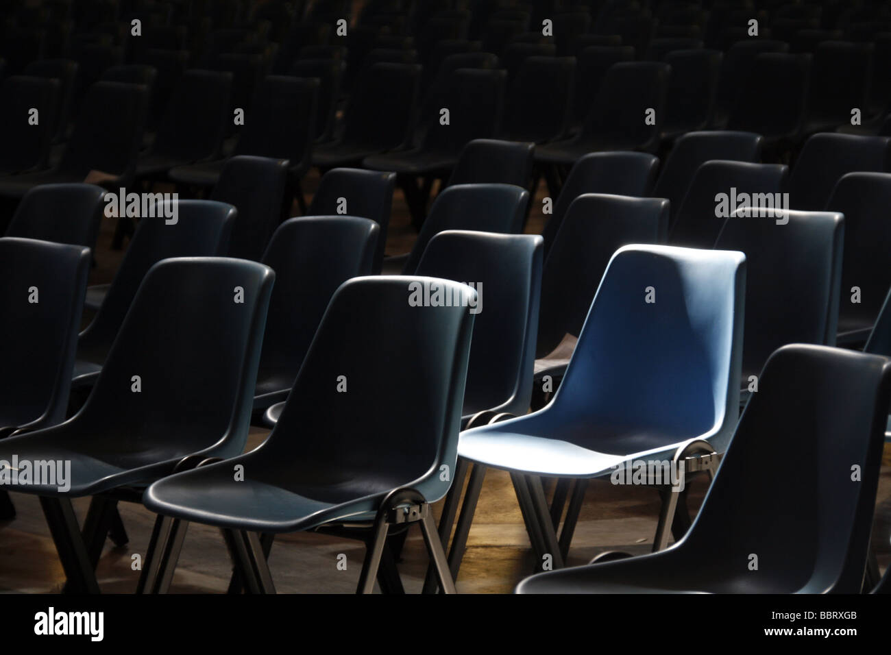 rows of empty plastic chairs in church in rome italy Stock Photo - Alamy