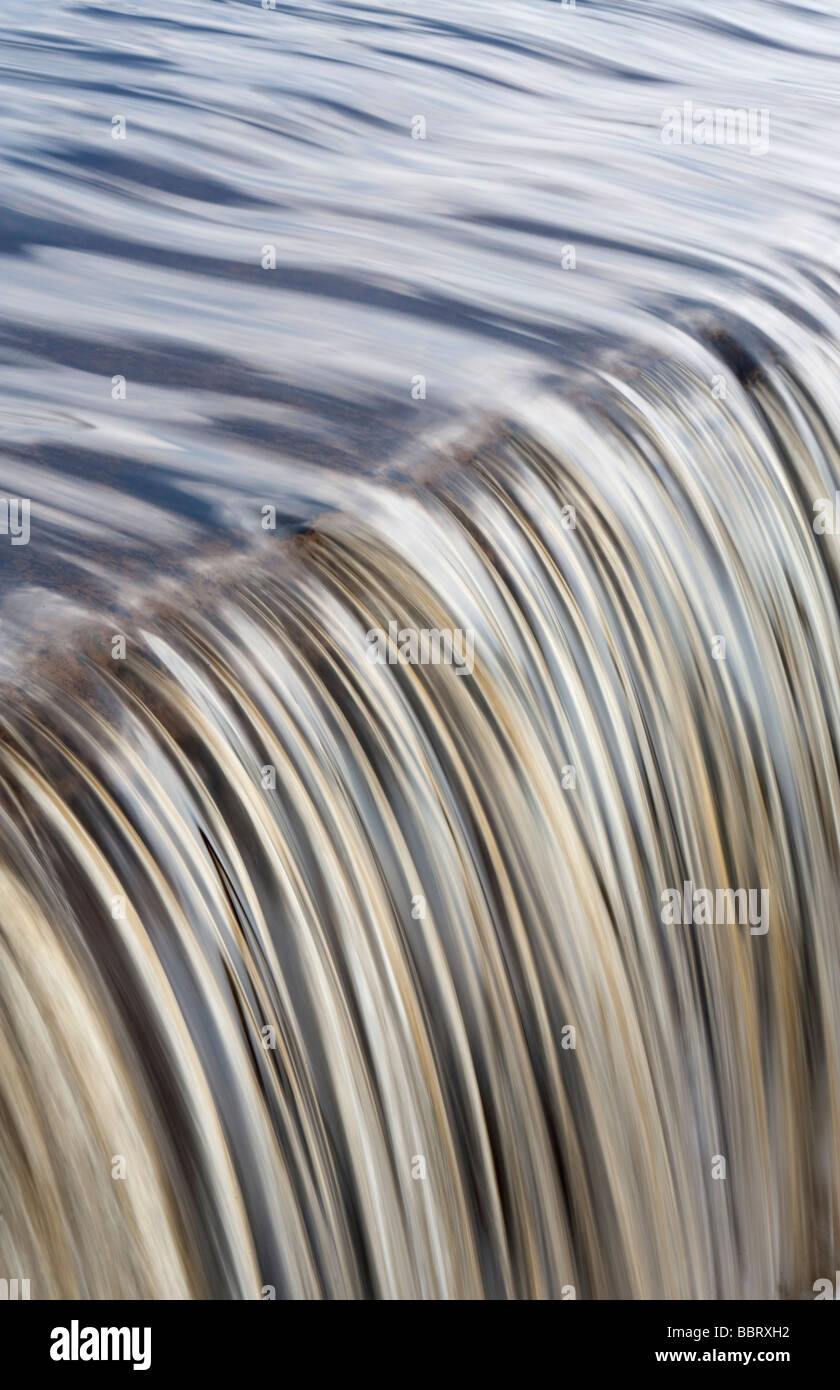 water flowing over submerged dam Stock Photo - Alamy