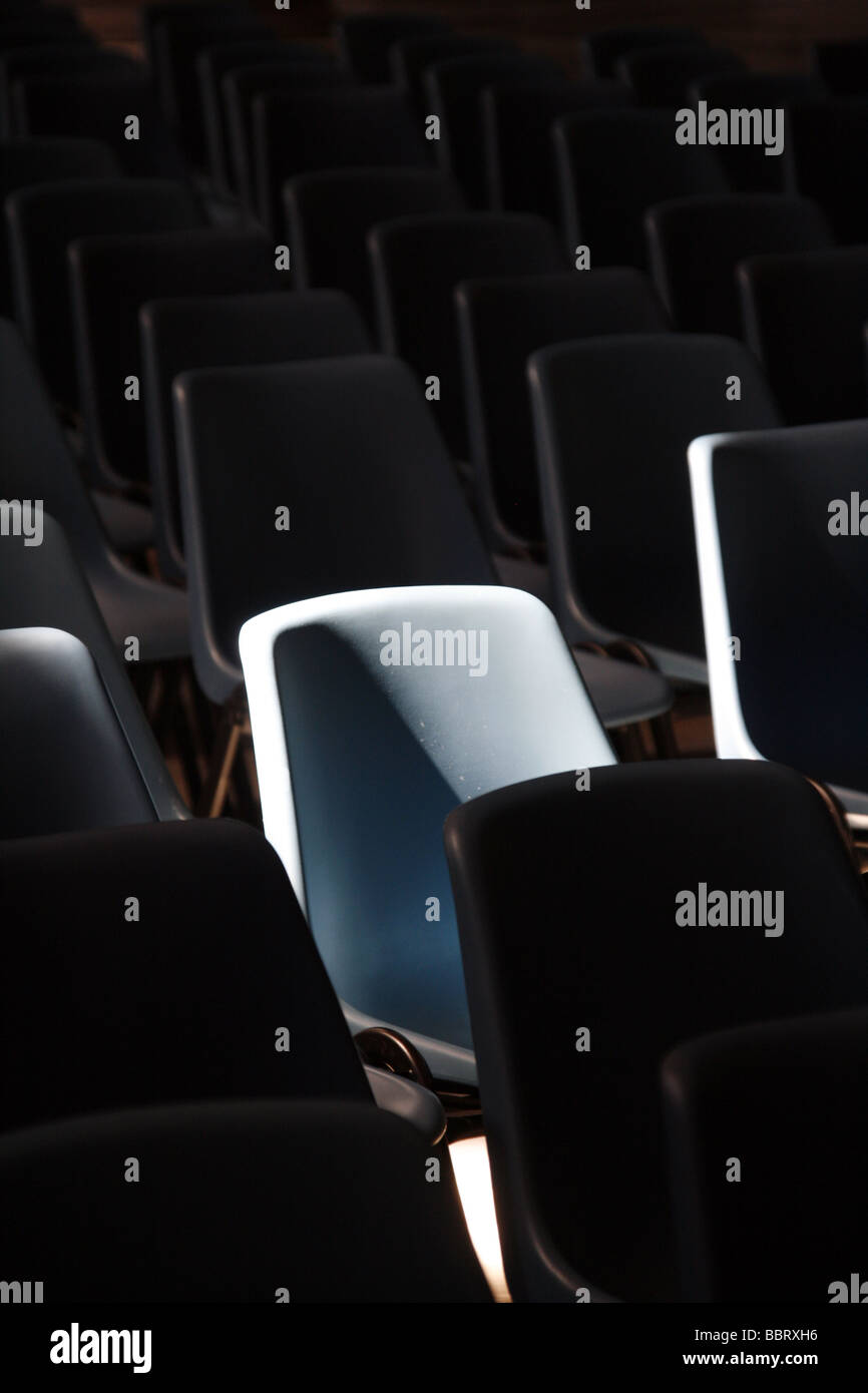 rows of empty plastic chairs in church in rome italy Stock Photo - Alamy