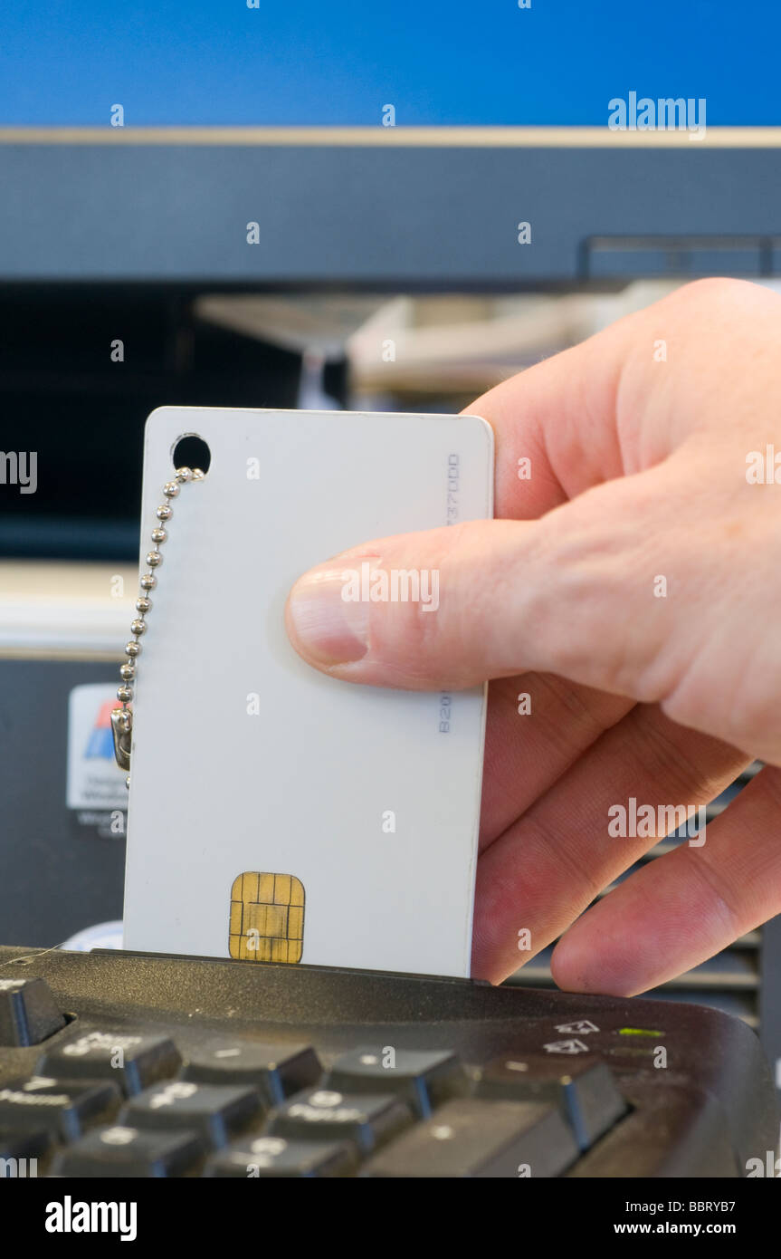 Computer access card being slotted hi-res stock photography and images ...