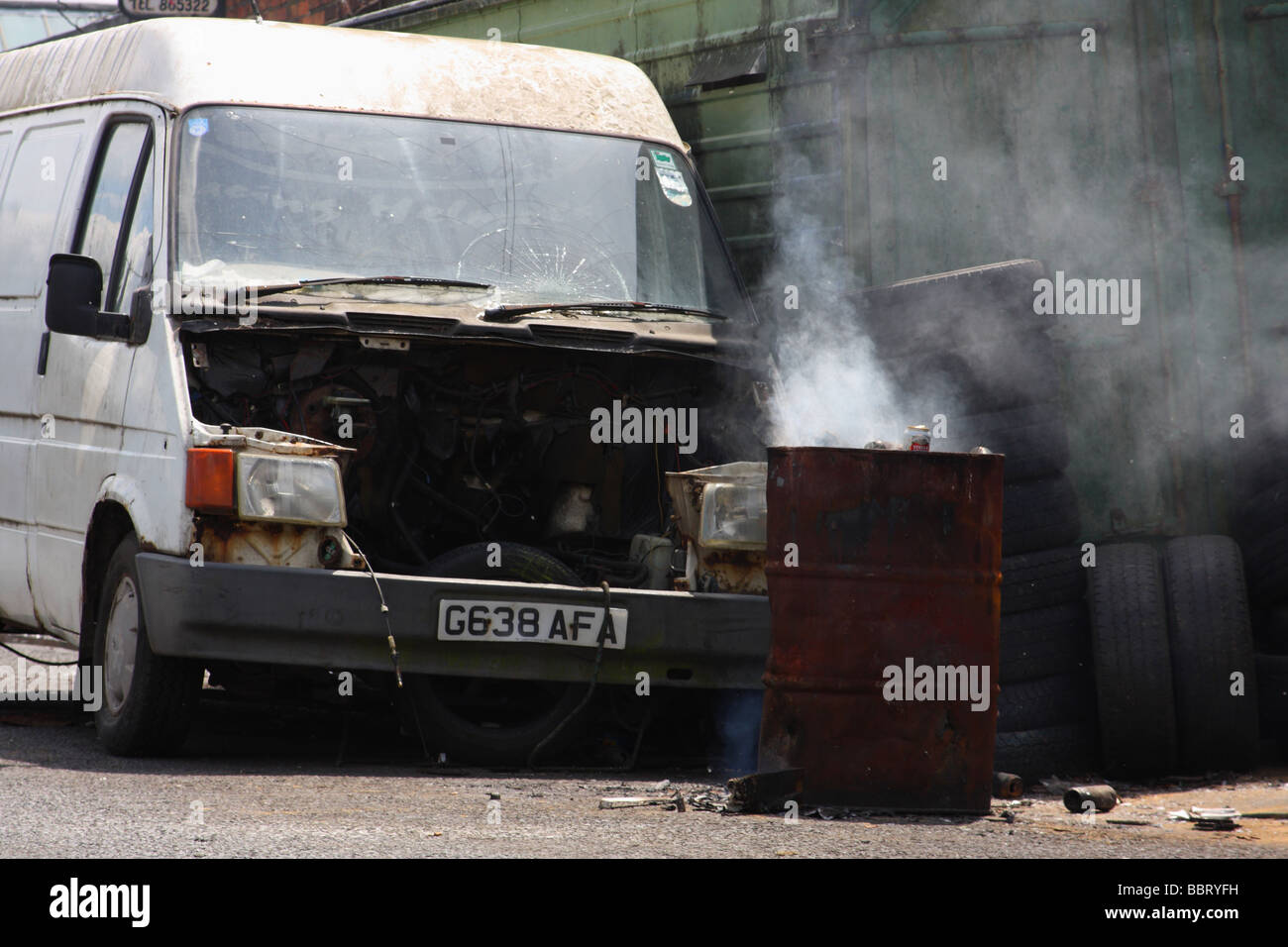 An abandoned Ford Transit van on a U.K. street Stock Photo - Alamy