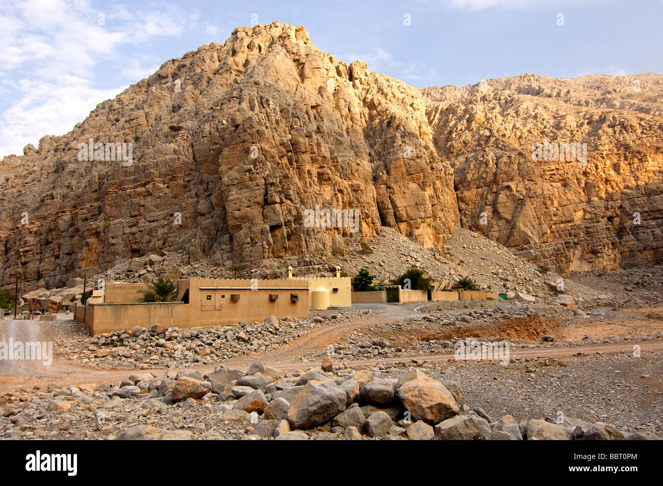 Traditional stone houses and mosque in the village Tawi, Wadi Qadah ...