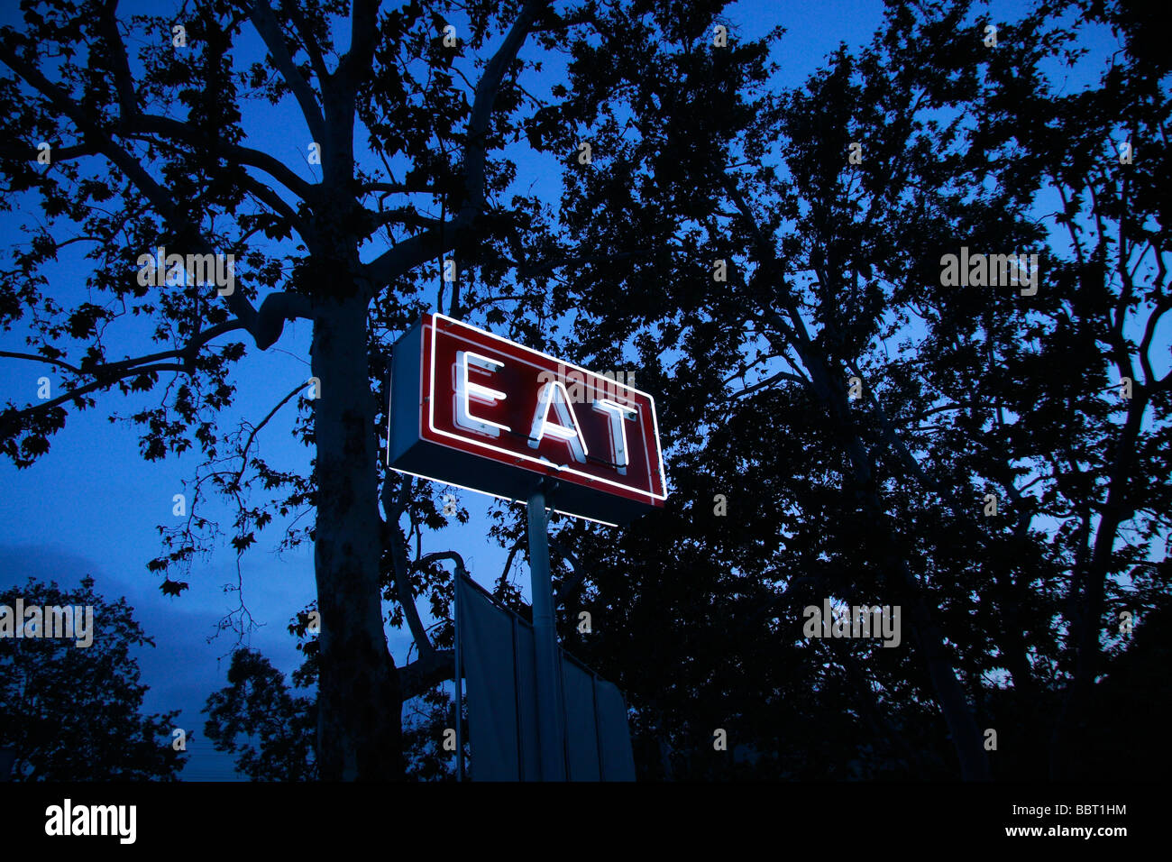 Neon Eat Sign Stock Photo - Alamy