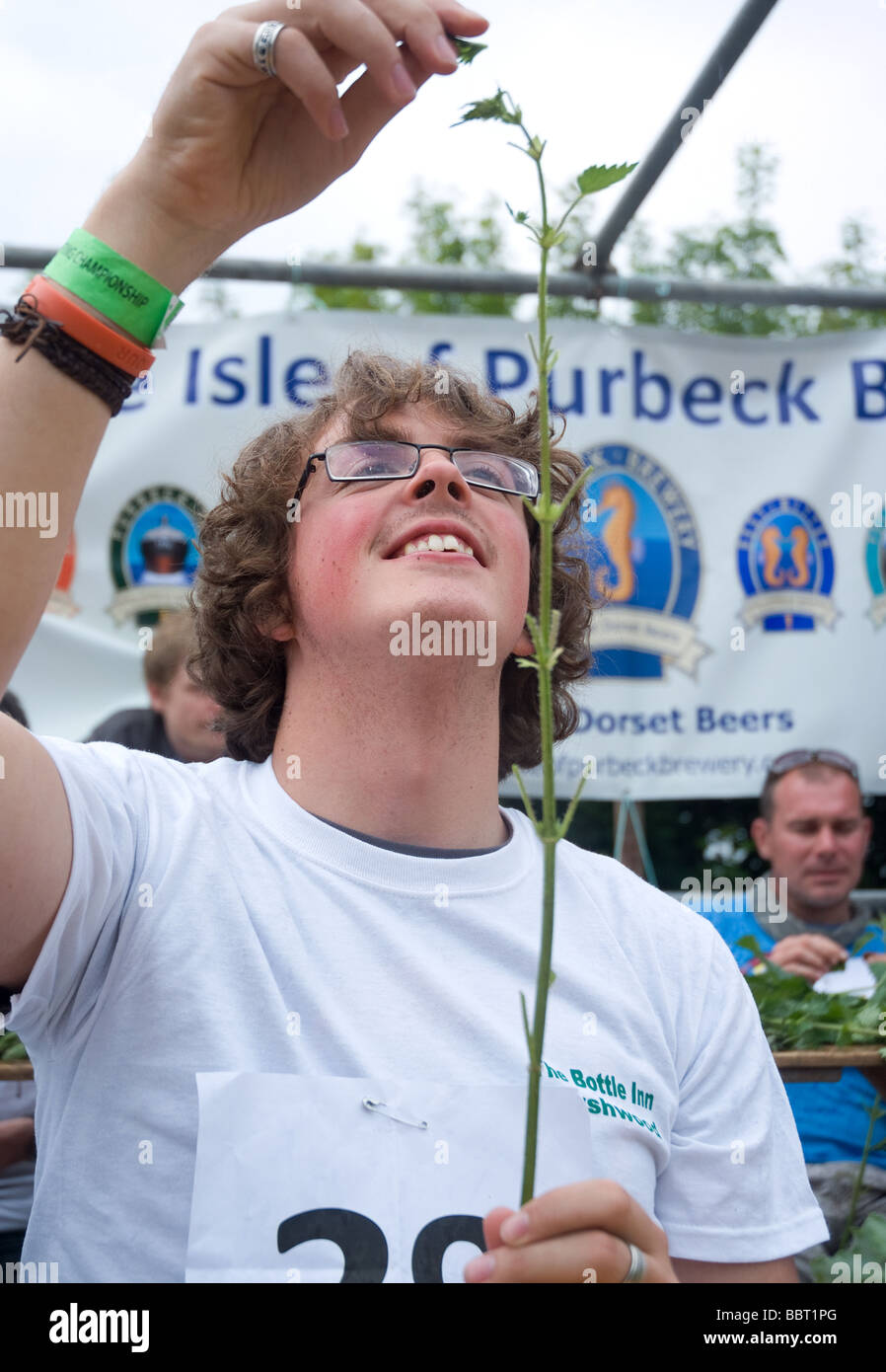 a competitor as almost completed 2ft of stinging nettles at the 2009 ...