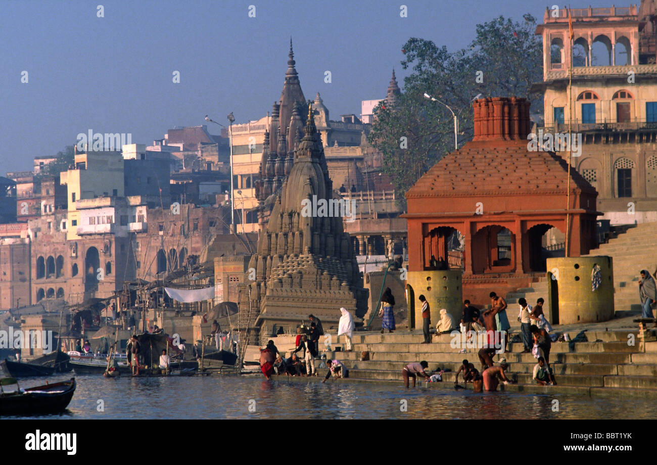 Sunset view of Ram Ghat and the sinking temple in Varanasi India Stock ...