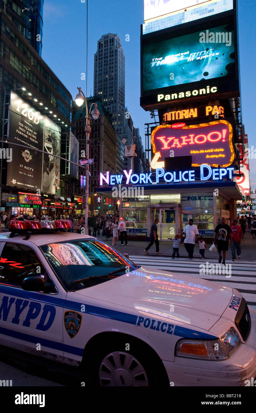 Time Square at night. NYPD Stock Photo - Alamy