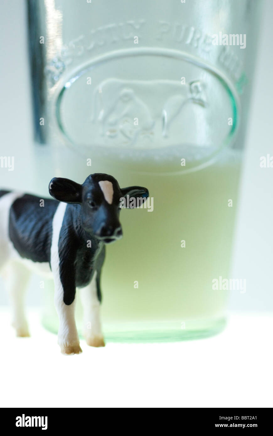 baby veal toy and a glass of milk Stock Photo - Alamy