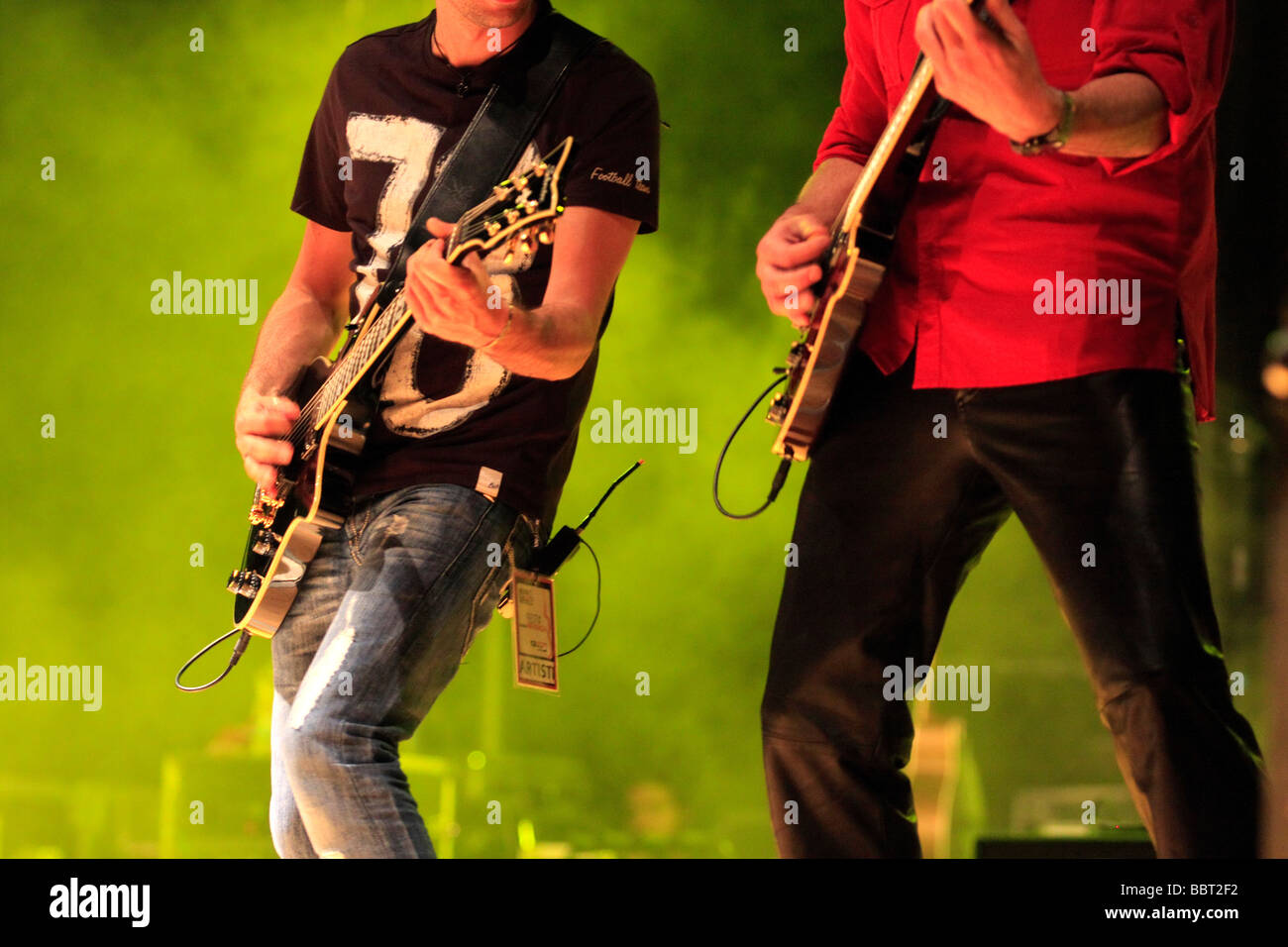 rock musicians playing at a live concert Stock Photo - Alamy