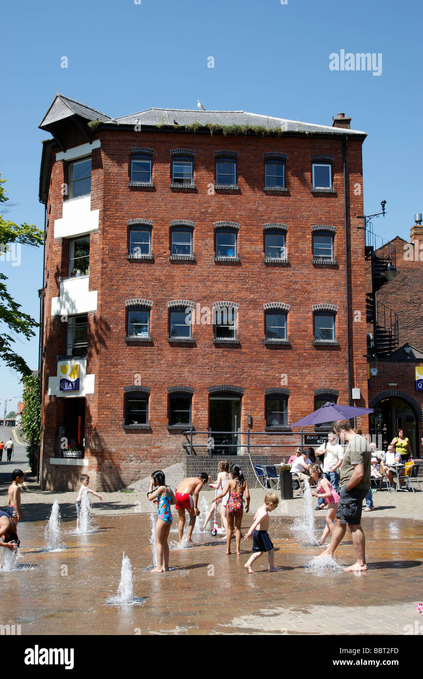 children playing in the quayhead square water fountain near st andrews ...