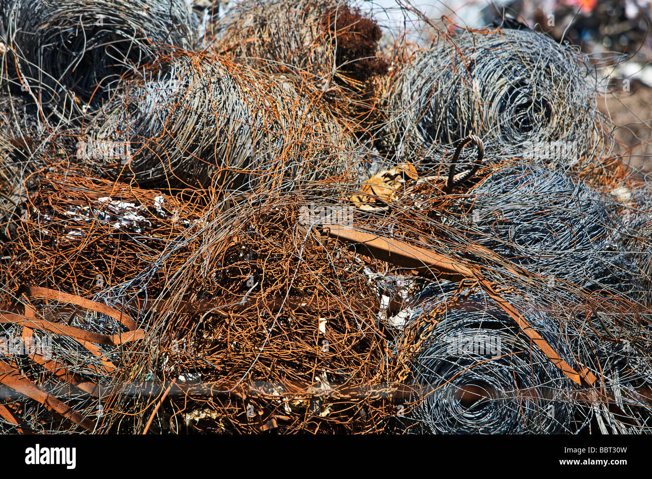 Bundles of wire at a recycling centre Stock Photo - Alamy
