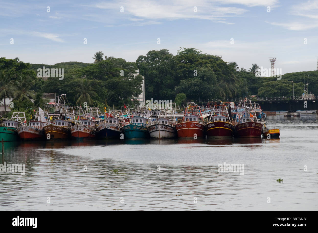 Fishing boats in harbour Stock Photo - Alamy