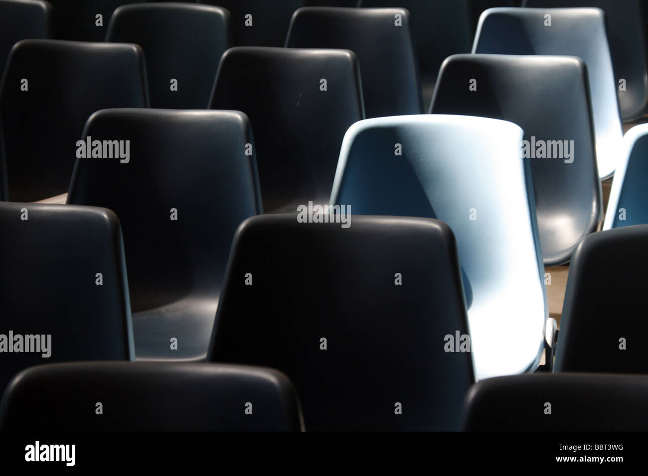 rows of empty plastic chairs in church in rome italy Stock Photo - Alamy