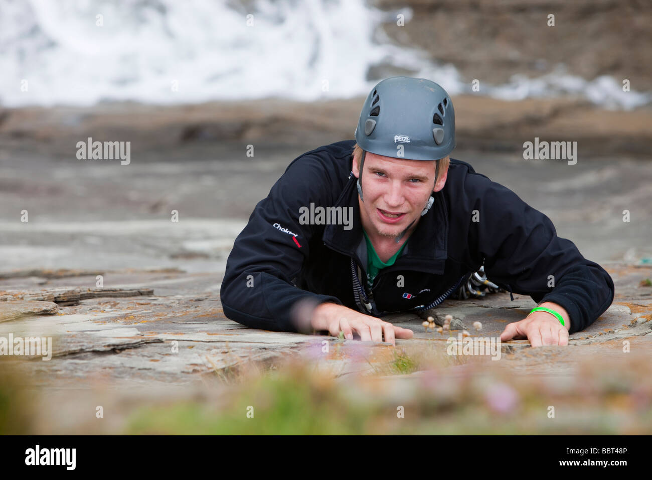 Climbers on a sea cliff climb on Baggy Point near Croyde in north Devon ...
