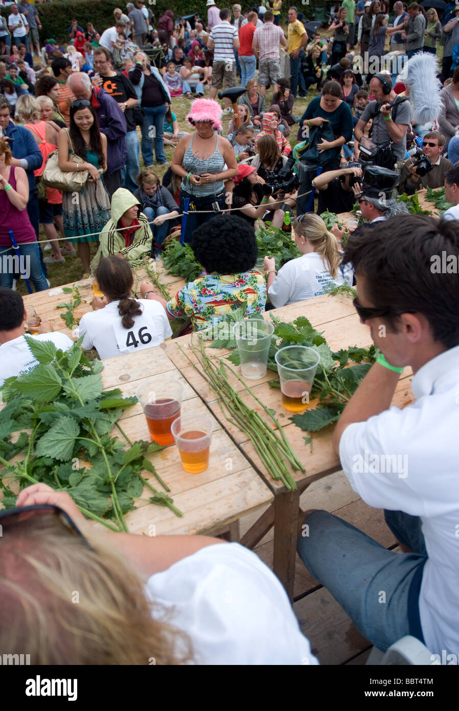 crowds gather to watch the world nettle eating championships , at the ...