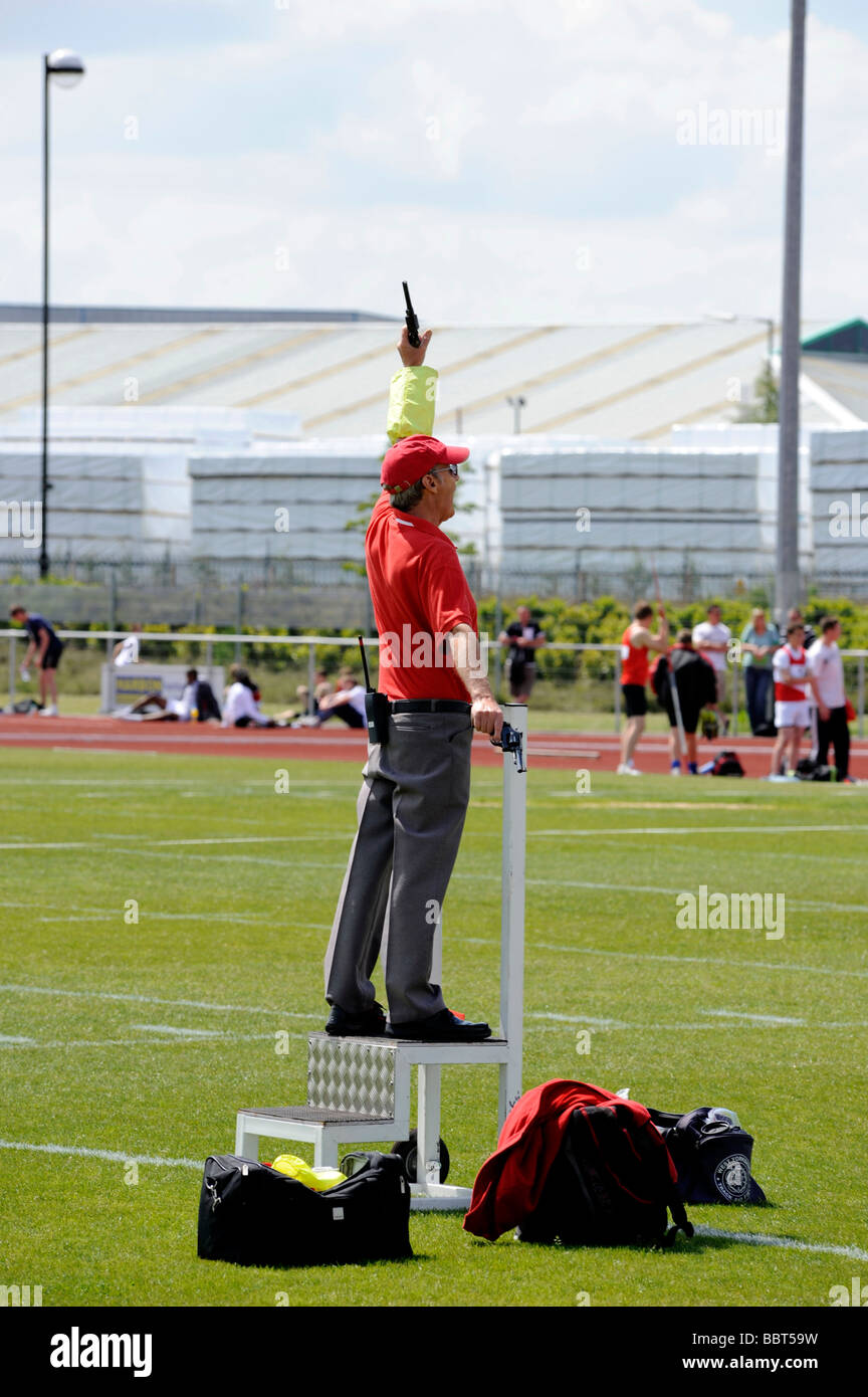 Starting official at athletic meeting Stock Photo - Alamy