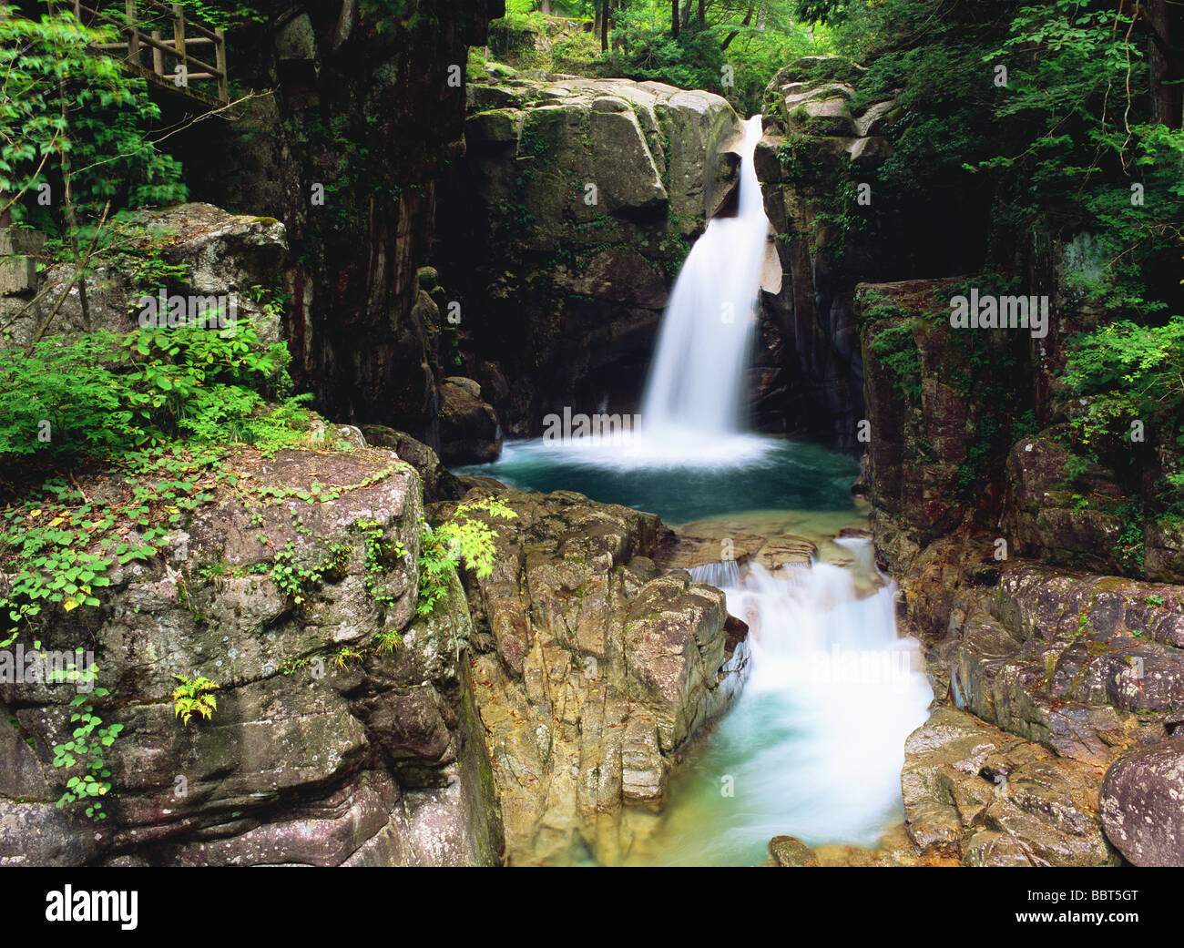 Stream of water falling Stock Photo - Alamy