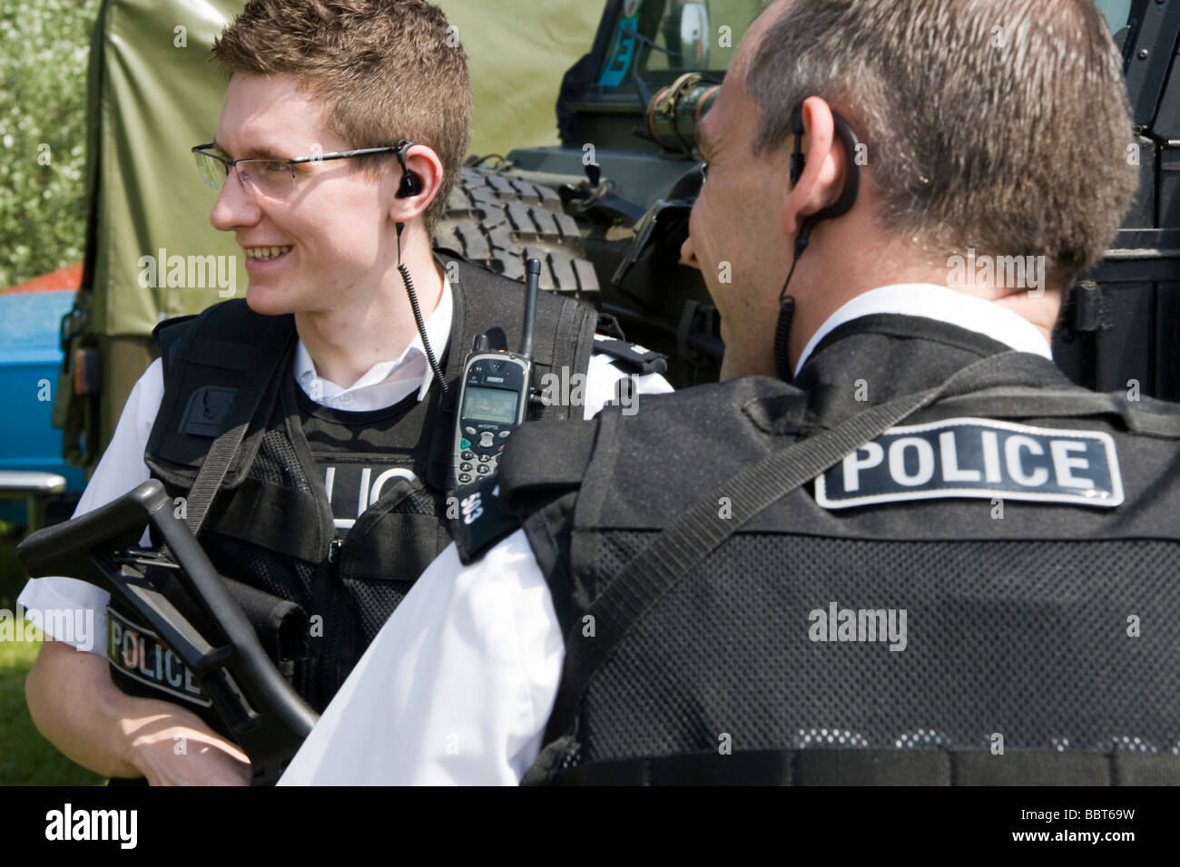 A very young looking armed police officer patrolling Sizewell nuclear ...