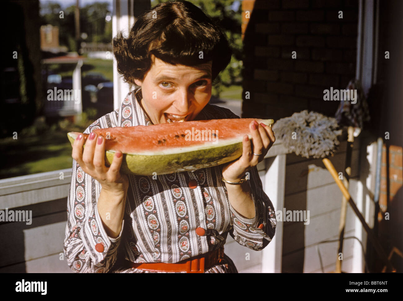Young woman eating watermelon Canada 1957 Stock Photo - Alamy