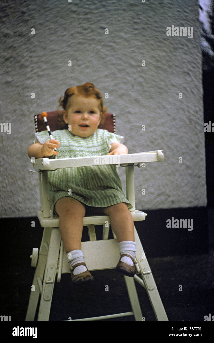 British toddler proudly displays her Belisha Beacon pencil in 1954 ...