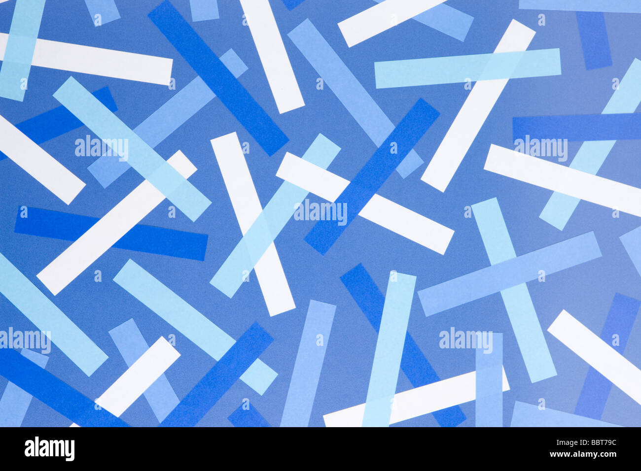 Blue and white paper strips on blue background Stock Photo - Alamy