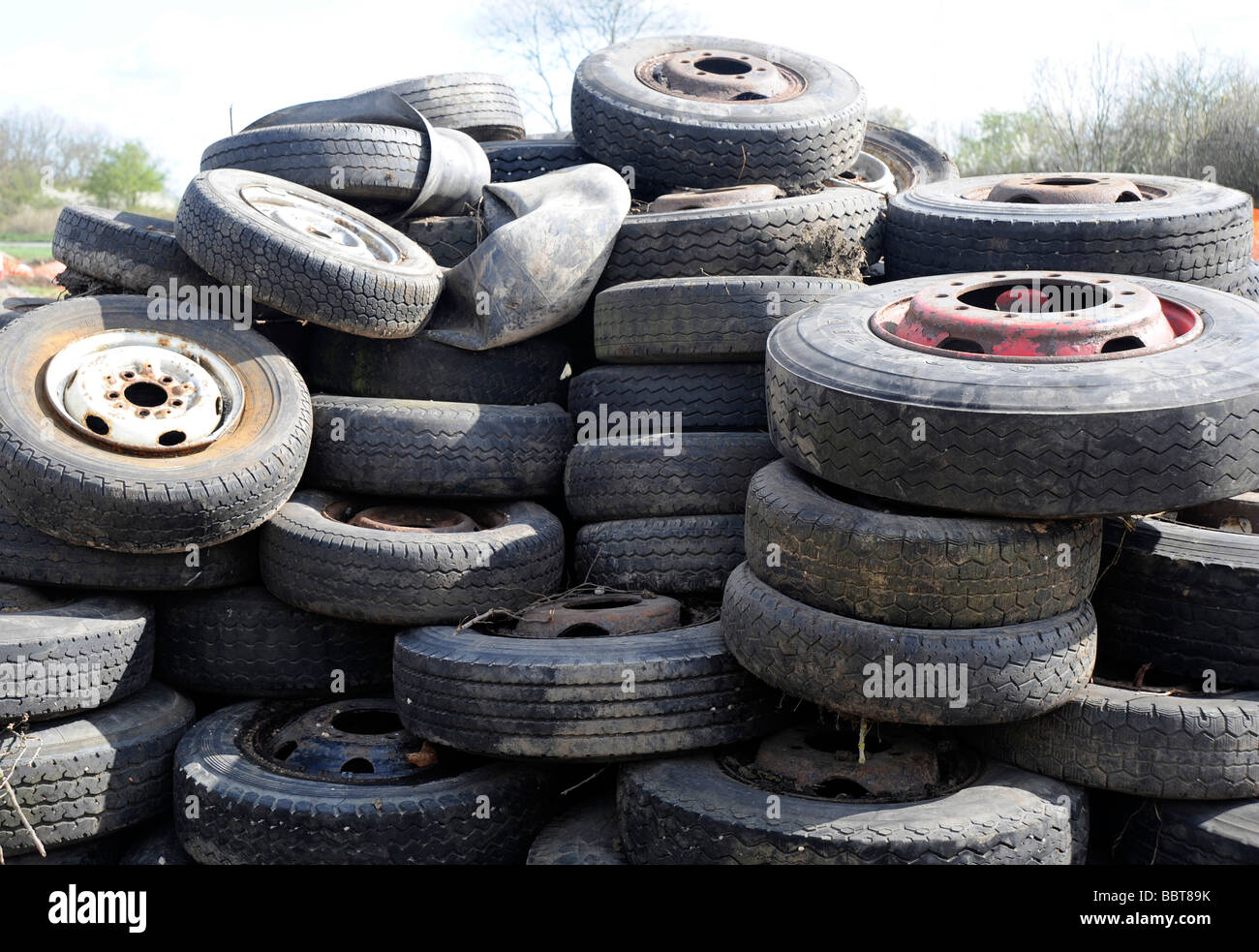 Old Tyres awaiting re-cycling, Northern England UK Stock Photo - Alamy
