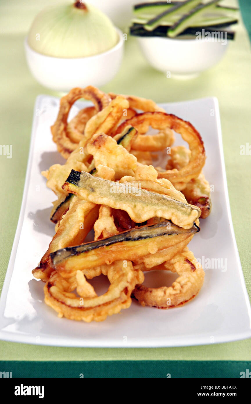 Fried onions and courgettes, Italy Stock Photo - Alamy