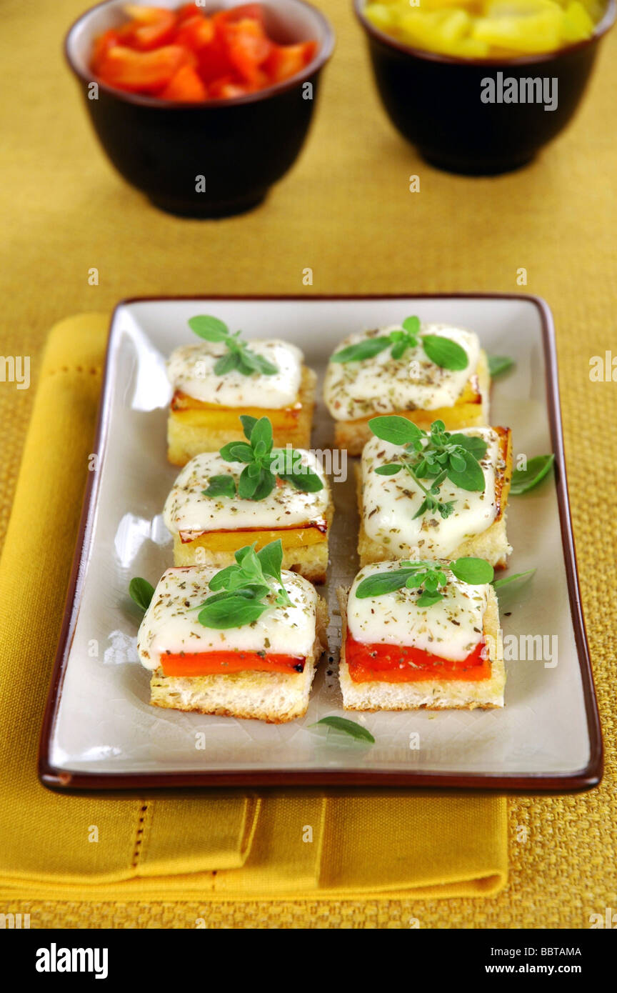 Small piece of toast with mozzarella cheese and pepper, Italy Stock ...