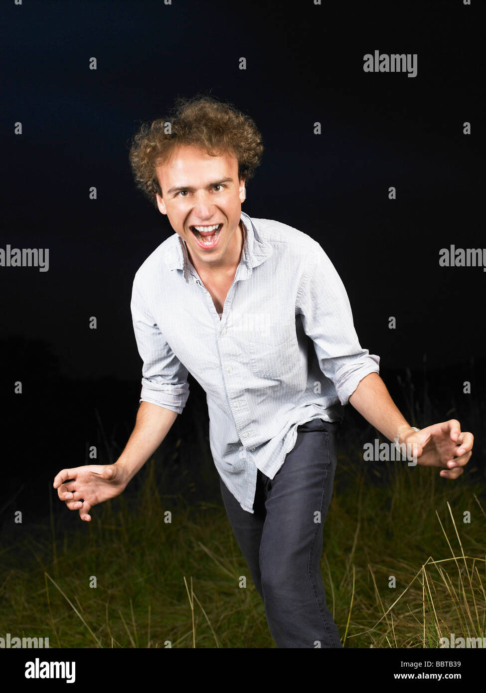 Man with an attitude, by night Stock Photo - Alamy