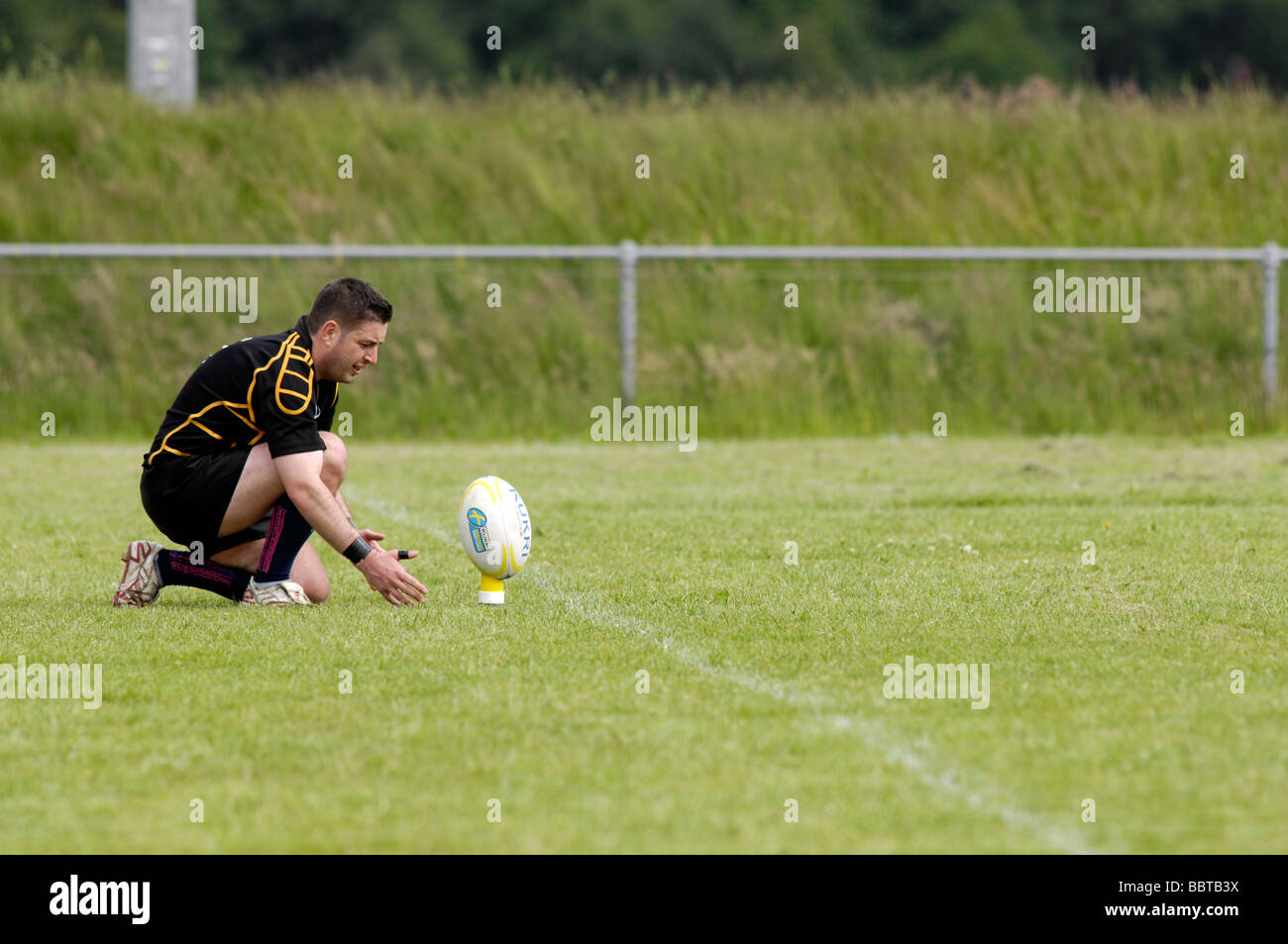 rugby player carefully places ball before attempting a conversion Stock ...