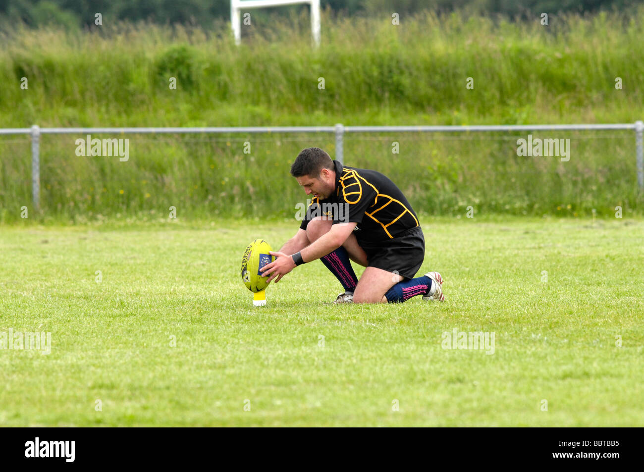 rugby player carefully places ball before attempting a conversion Stock ...