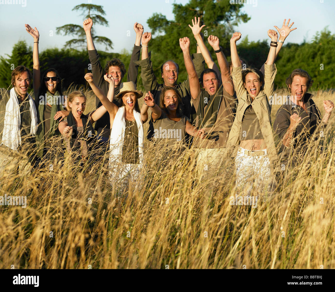 group of people smiling at camera Stock Photo - Alamy