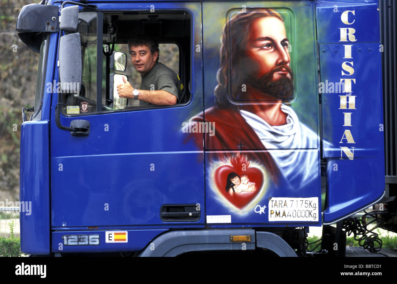 Valencia a truck decorated with a painting of Jesus Stock Photo - Alamy