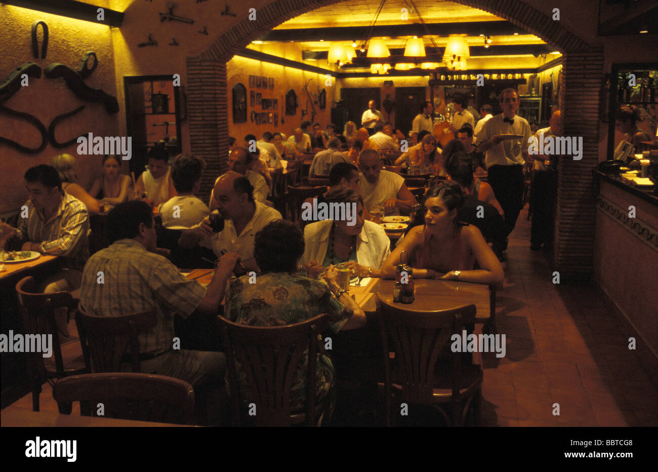 Valencia inside a restaurant at night Stock Photo - Alamy