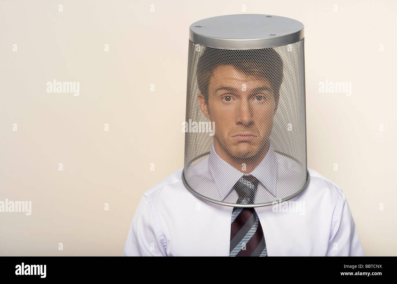 Business man bin on head hi-res stock photography and images - Alamy